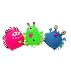 View Googly Eye Monster Squishy Toy