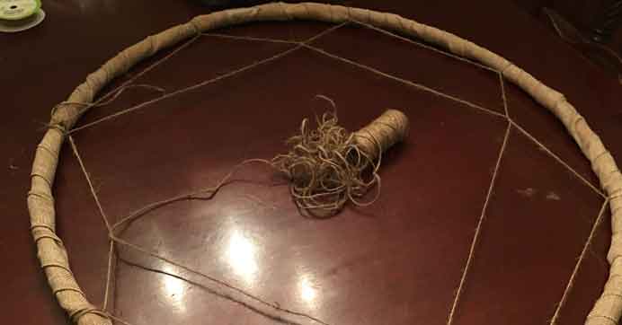 Wrap twine around the loop