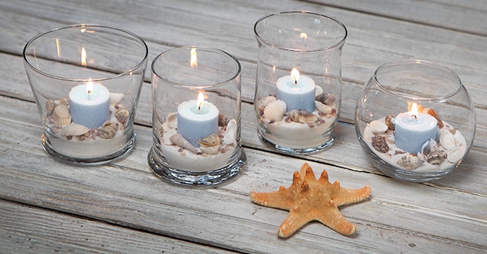 Vases filled with sand and shells