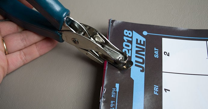 Hole punch the calendar