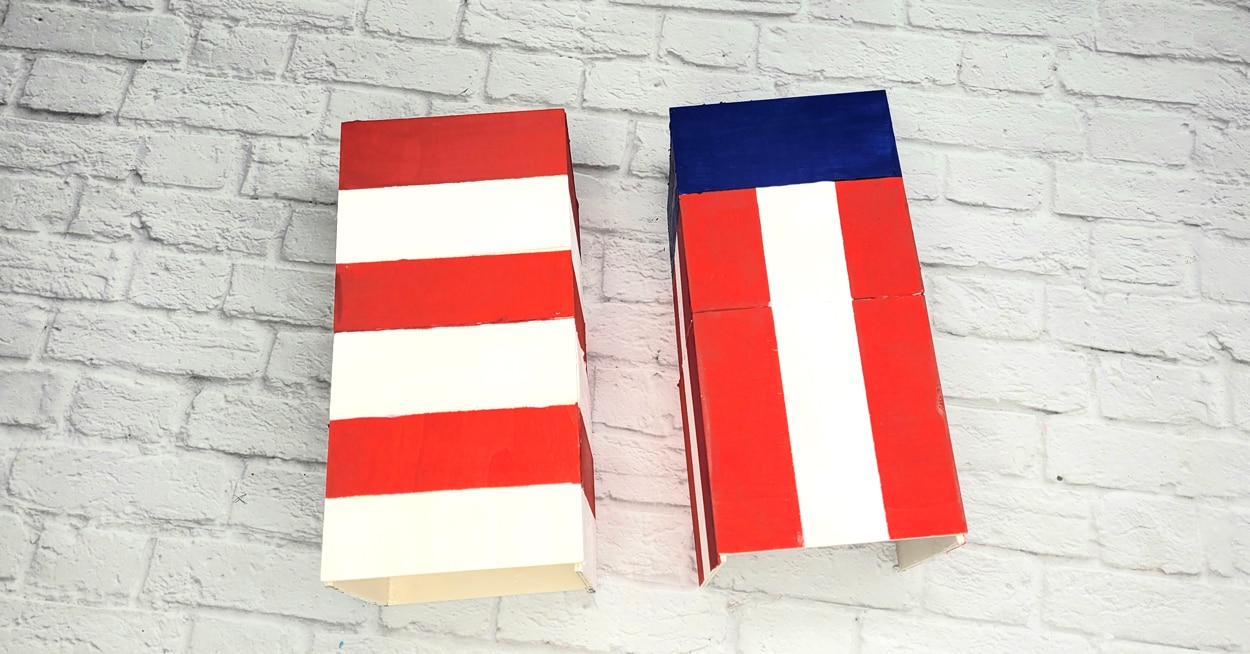 A box with red and white horizontal stripes, and a box with red and ...