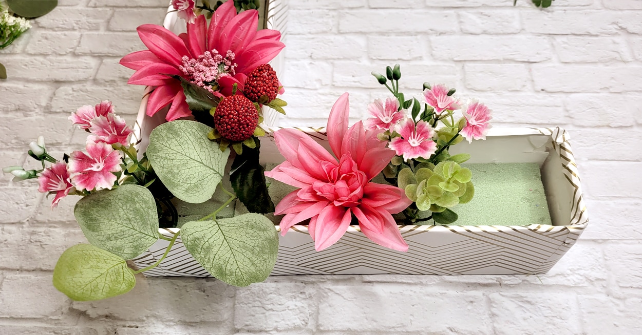 Flowers in a box with floral foam.